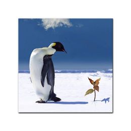 Bilderdepot24 Leinwandbild Pinguin mit Blume