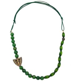 Gallay Perlenkette Kunststoffperlen grün-glänzend Holzperlen grün Kordel grün 90cm (1-tlg)