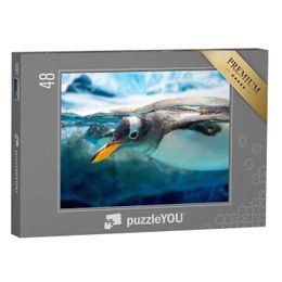 puzzleYOU Puzzle Schwimmender Pinguin