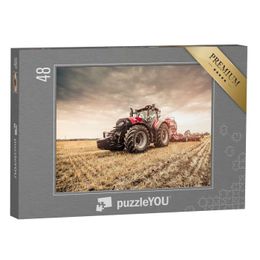 puzzleYOU Puzzle Roter Traktor bei der Feldarbeit