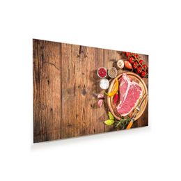 Primedeco Glasbild Wandbild T-Bone Steak im Teller mit Aufhängung
