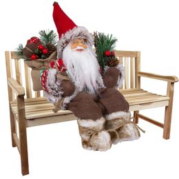 Christmas Paradise Weihnachtsmann Magnus 45cm / 30cm, sitzend (Dekofigur rot-braun, 1 St., Weihnachtsdeko), Kantenhocker zum Hinsetzen, bunt