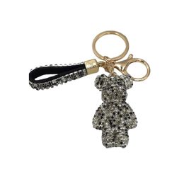 Steinfixx® Schlüsselanhänger Edler Strass Teddybär Cartoon Schlüsselanhänger mit Lederband (Teddybär Anhänger mit Schlüsselring und Karabinerhaken sowie Schlaufe)