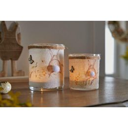Dekoleidenschaft - 2x Windlicht Puschel aus Glas, mit Hasen Motiv auf Jute Stoff, Kerzenhalter, Teelichthalter, Windlichtglas, Teelichtgläser
