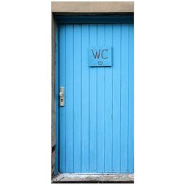 Wallario Türtapete Blaue Tür einer Toilette in einer verlassenen Fabrik in Magdeburg