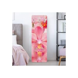 Bilderdepot24 Garderobenpaneel pink Blumen Floral Rosa Orchideen auf Wasser Design (ausgefallenes Flur Wandpaneel mit Garderobenhaken Kleiderhaken hängend)