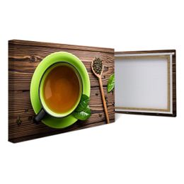 wandmotiv24 Leinwandbild Draufsicht auf eine Teetasse