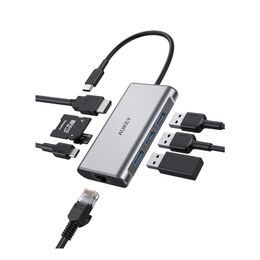 Aukey CB-C91 8 in 1 USB C Hub mit 4K HDMI, Gigabit Ethernet Port Silber, 1 USB Power Delivery-Ladeanschluss und SD & Micro SD Kartensteckplätze.