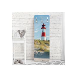 Bilderdepot24 Garderobenpaneel blau Natur Strand Meer Leuchtturm an der Nordsee Design (ausgefallenes Flur Wandpaneel mit Garderobenhaken Kleiderhaken hängend)