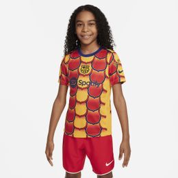 FC Barcelona Academy Pro Nike Dri-FIT-Pre-Match-Fußballoberteil für ältere Kinder - Gelb