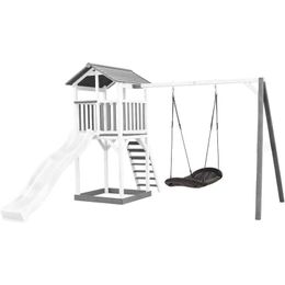 AXI Beach Tower Spielturm aus Holz in Weiß & Grau Spielhaus für Kinder mit weißer Rutsche, Roxy Nestschaukel und Sandkasten Stelzenhaus für den Garten
