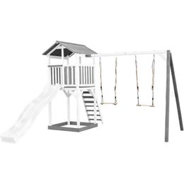 AXI Beach Tower Spielturm aus Holz in Weiß & Grau Spielhaus für Kinder mit weißer Rutsche, Doppelschaukel und Sandkasten Stelzenhaus für den Garten