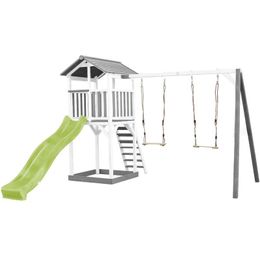 AXI Beach Tower Spielturm aus Holz in Weiß & Grau Spielhaus für Kinder mit hellgrüner Rutsche, Doppelschaukel und Sandkasten Stelzenhaus für den Garten