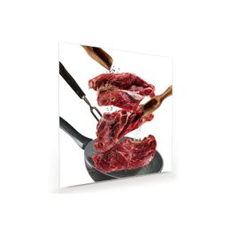 Primedeco Glasbild Wandbild Quadratisch Steak auf Pfanne mit Aufhängung