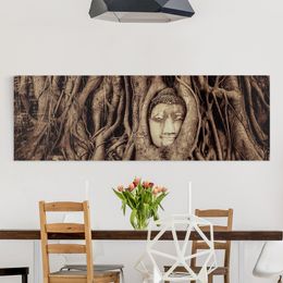 Leinwandbild Buddha in Ayutthaya von Baumwurzeln ges&auml;umt in Braun - Wandbild bis XXL Print Botanik Tropical Spirituell Wald B&auml;ume Vintage Wohnzimmer