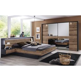 Rauch Schlafzimmer Ventura-Plus, schwarz/Eiche Sanremo dunkel Nachbildung, 180 x 200 cm, Schrank 300 x 223 cm