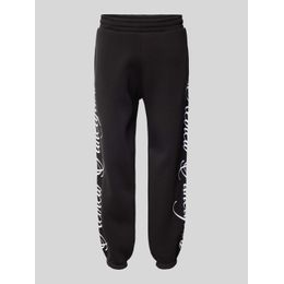 Review Sweatpants mit Label-Stitching