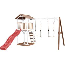 AXI Beach Tower Spielturm aus Holz in Braun & Weiß Spielhaus für Kinder mit roter Rutsche, Doppelschaukel und Sandkasten Stelzenhaus für den Garten