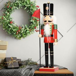 ECD Germany - Nussknacker Figur Soldat, 38 cm, aus Holz, Dekofigur mit schwarzer Hut und Fahne, handbemalt, Weihnachten Holzfigur Puppet Marionette
