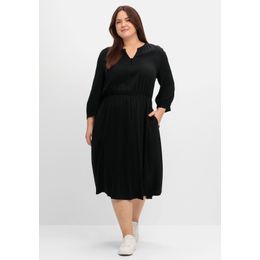 sheego Große Größen: Tailliertes Kleid mit Taschen, in Strukturqualität, schwarz, Gr.54