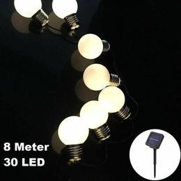 TRADESHOP 30 led / 8 Meter Solar Lichterkette Glühbirnen Matt Deko Warm-Weiß Solarbetrieben zum Schmücken Deko Party Licht Beleuchtung