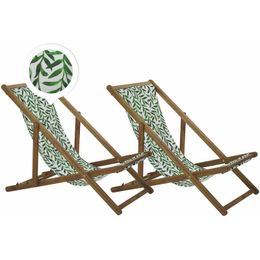 Beliani Liegestühle 2er Set aus hellem Akazienholz mit weiß-grünem Bezug zusammenklappbar Blattmuster Gartenausstattung Outdoor Gartenzubehör Modern - Grün