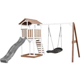 AXI Beach Tower Spielturm aus Holz in Braun & Weiß Spielhaus für Kinder mit grauer Rutsche, RoxyRoxy Nestschaukel und Sandkasten Stelzenhaus für den