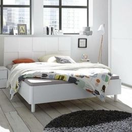 Doppelbett aus Holz in matt lackierter weißer Optik
