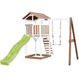 AXI Beach Tower Spielturm aus Holz in Braun & Weiß Spielhaus für Kinder mit hellgrüner Rutsche, Schaukel und Sandkasten Stelzenhaus für den Garten