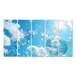 islandburner Leinwandbild Schwebende blaue Blasen gleiten elegant durch den himmelblauen Hinterg