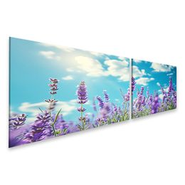 islandburner Leinwandbild Nahaufnahme: Duftende Lavendelblüten unter blauem Himmel - Bio-Kosmeti