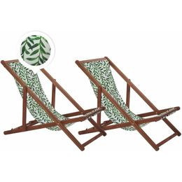 Beliani Liegestühle 2er Set aus dunklem Akazienholz mit weiß-grünem Bezug zusammenklappbar Blattmuster Gartenausstattung Outdoor Gartenzubehör Modern - Grün