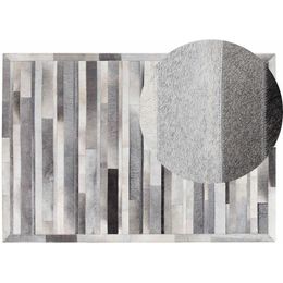 Beliani Teppich Grau 140 x 200 cm aus Leder mit Streifen Handgefertigt Rechteckig Modern - Braun