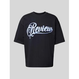 Review T-Shirt mit Label-Print