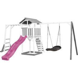 AXI Beach Tower Spielturm aus Holz in Weiß & Grau Spielhaus für Kinder mit lila Rutsche, Klettergerüst, Roxy Nestschaukel und Sandkasten Stelzenhaus für