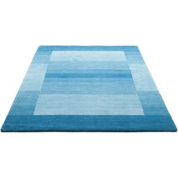 Wollteppich Theko "Gabbeh Super, Handweb Teppich, Bordüre, reine Schurwolle, handgewebt" Teppiche Gr. B/L: 240 cm x 340 cm, 9 mm, 1 St., blau Schurwollteppiche