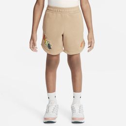 Nike Sportswear Create Your Own Adventure French-Terry-Shorts mit Grafik für kleine Kinder - Braun