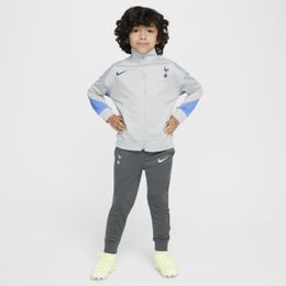 Tottenham Hotspur Strike Nike Dri-FIT Fußball-Trainingsanzug aus Strickmaterial (jüngere Kinder) - Grau