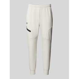 Under Armour Regular Fit Sweatpants mit Reißverschlusstasche Modell 'UNSTOPPABLE'