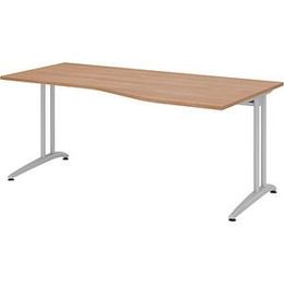 Hammerbacher BS18 Schreibtisch nussbaum Trapezform, C-Fuß-Gestell silber 180,0 x 80,0/100,0 cm