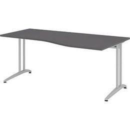 Hammerbacher BS18 Schreibtisch grafit Trapezform, C-Fuß-Gestell silber 180,0 x 80,0/100,0 cm