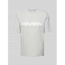 Review T-Shirt mit Label-Print