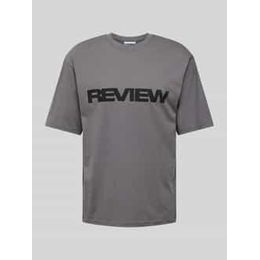 Review T-Shirt mit Label-Print