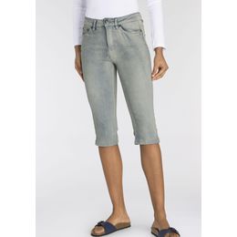 Caprijeans Arizona "mit Schlitz am Saum" Gr. 34, N-Gr, blau (blue-bleached) Damen Jeans schmale Passform, mit stylischen Nieten, hohe Taille