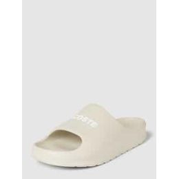 Lacoste Slides mit Label-Print