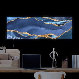 LED-Wechselbild Goldene Glitzer Wellen vor Blau