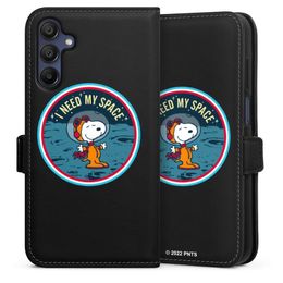 DeinDesign Galaxy A15 Handy Klapph&uuml;lle Handyh&uuml;lle aus Kunst Leder schwarz Flip Case Peanuts Weltall Snoopy Sideflip mit Lasche