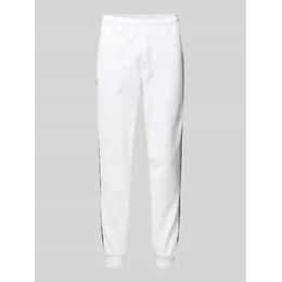 Lacoste Loose Fit Sweatpants aus reiner Baumwolle Modell 'TAPE'