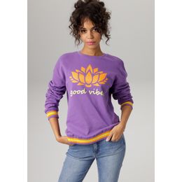 Sweatshirt Aniston CASUAL, Damen, Gr. 40, bunt (lila, orange, limette), angeraute Sweatware, Obermaterial: 100% Baumwolle, bedruckt, gestreift, Modisch, lässig geschnitten hüftbedeckend, Rundhals, Rippstrickbündchen, Sweatshirts, Frontdruck mit abstrakter Seerose und Schriftzug, Topseller