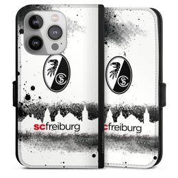 DeinDesign iPhone 14 Pro Handy Klapph&uuml;lle Handyh&uuml;lle aus Kunst Leder schwarz Flip Case Skyline Sc Freiburg Logo Sideflip mit langer Lasche